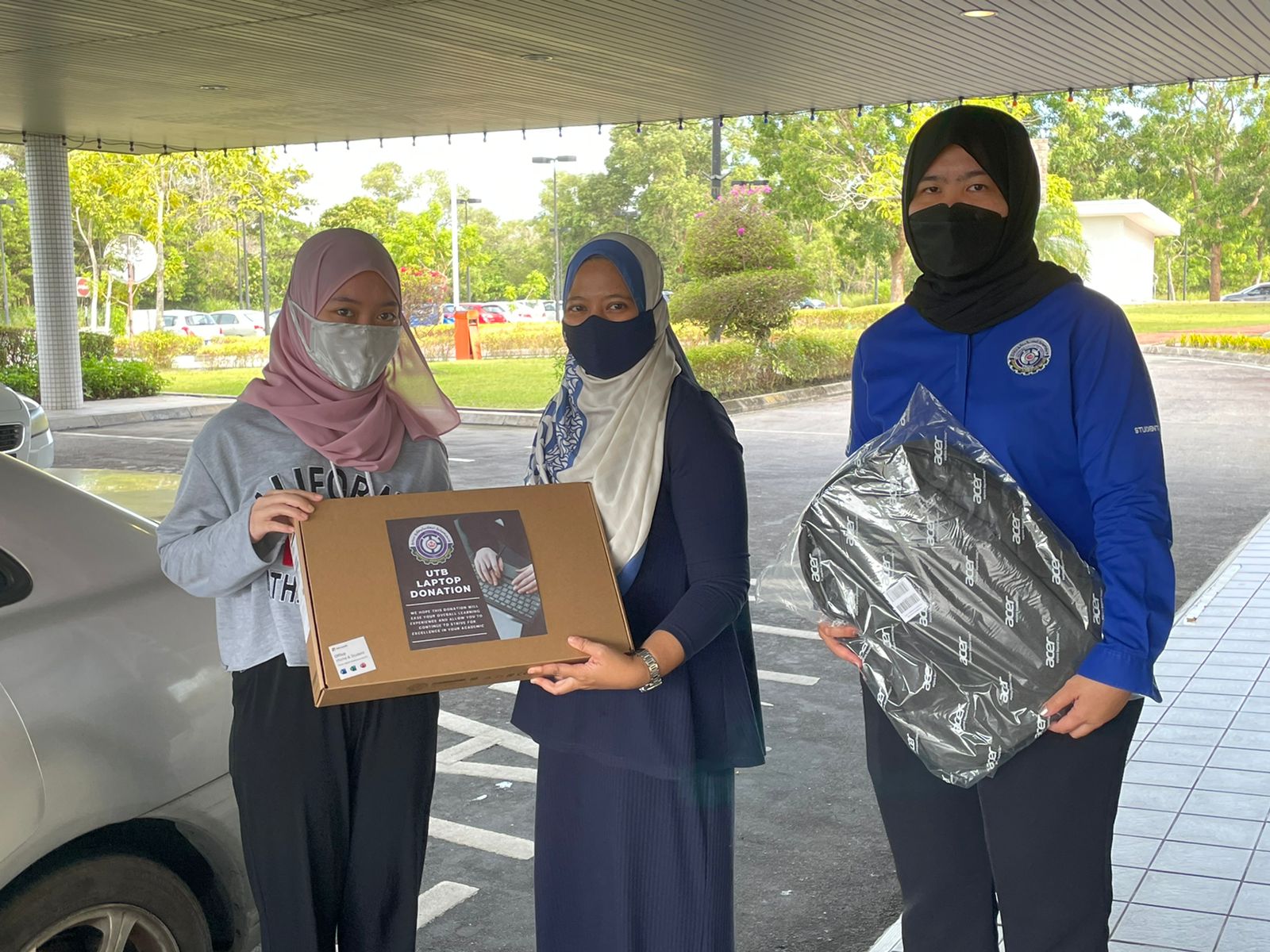 UTB HOLDS UTB LAPTOP DONATION - EB